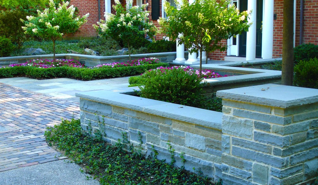 Bluestone veneer wall with rock faced thermal bluestone coping - Hirsch ...