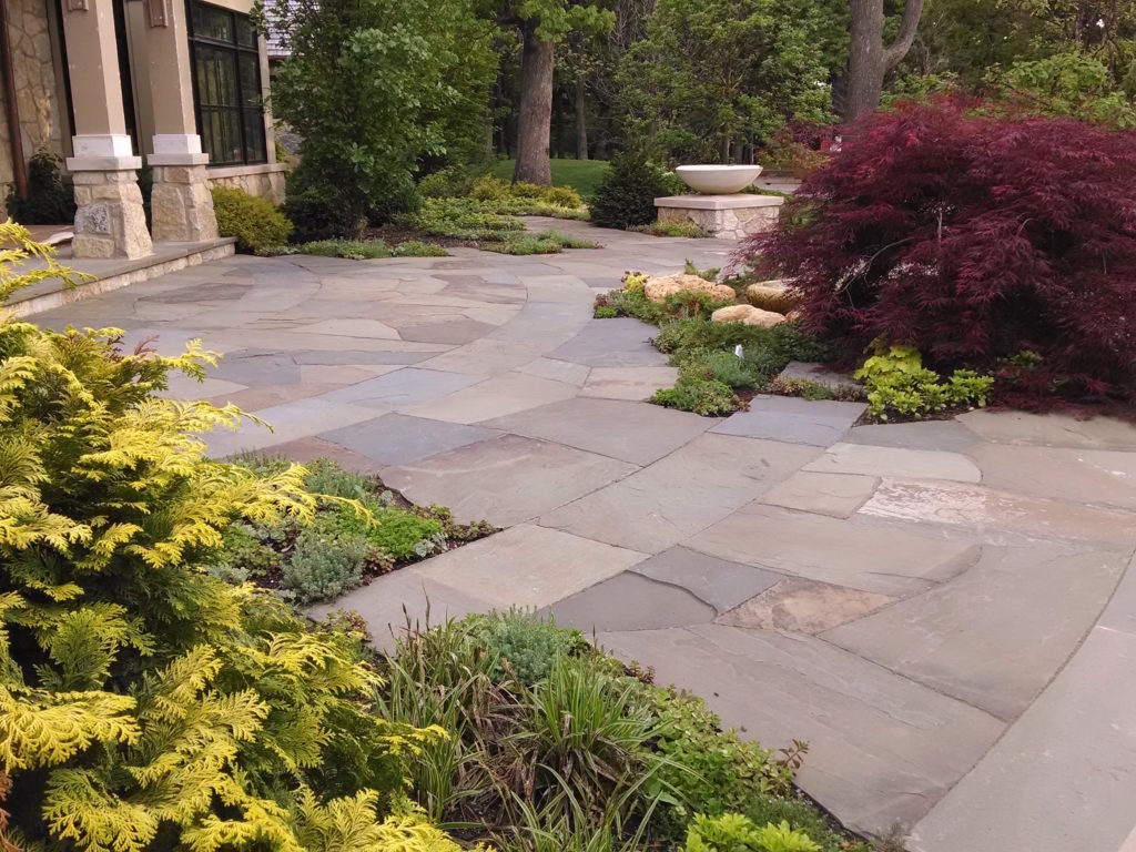 Full range bluestone terrace mixing radial cut bluestone bands and ...